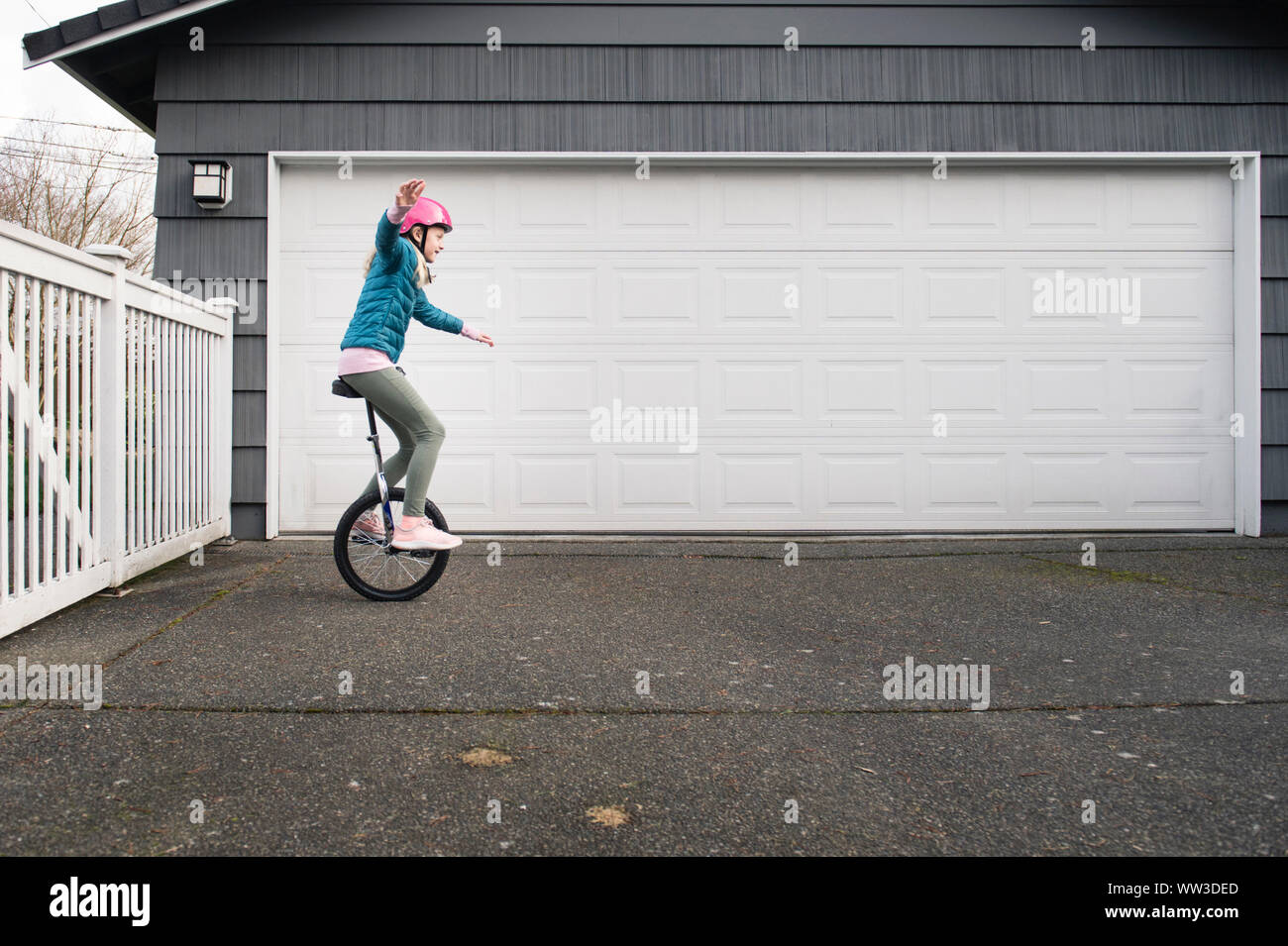 Child unicycle hi-res stock photography and images - Alamy