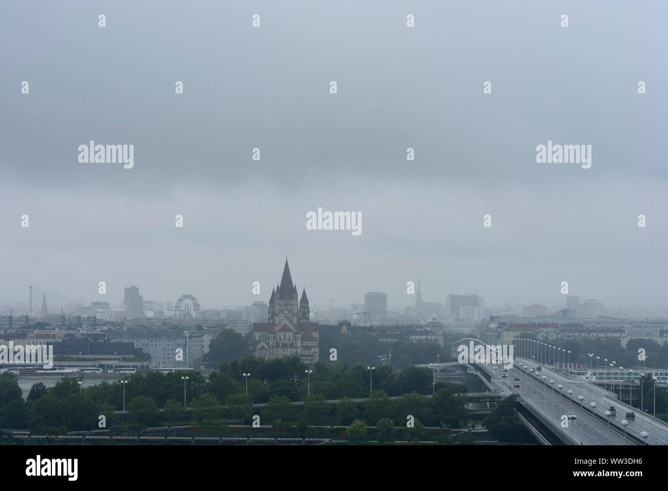 Wien, Vienna: rain over Vienna city center, river Danube, bridge ...