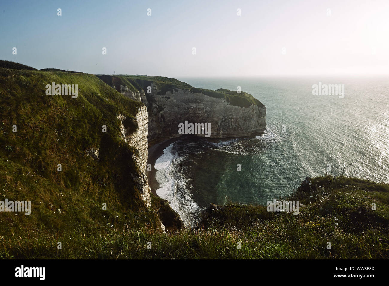 Beautiful rocks covered with grass in the shores of Normandy Stock ...