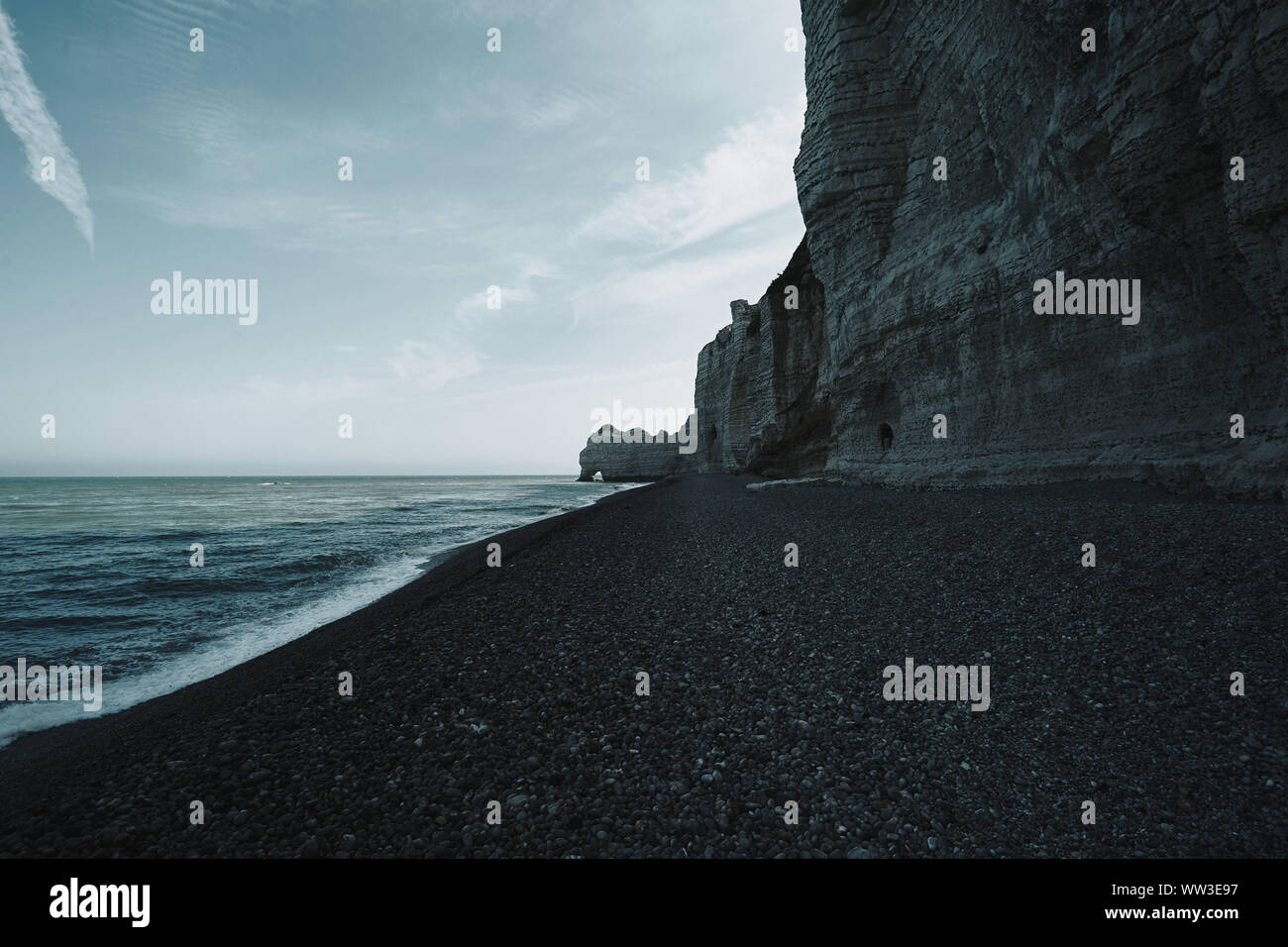 Pebble seashore with huge rocks in Etretat, Normandy Stock Photo - Alamy