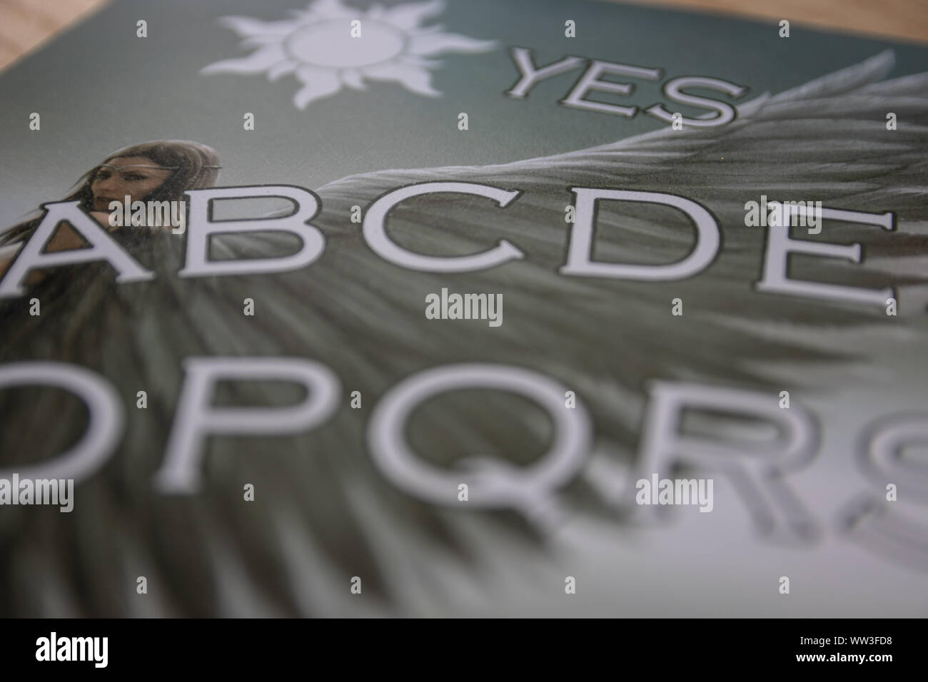 a close up of an angel board used to evoke spirits or angels much the ...