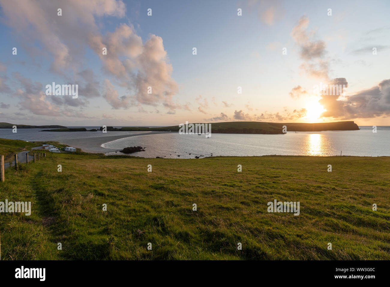 St Ninian’s beach at sunset with St Ninian's Isle, connected by a ...