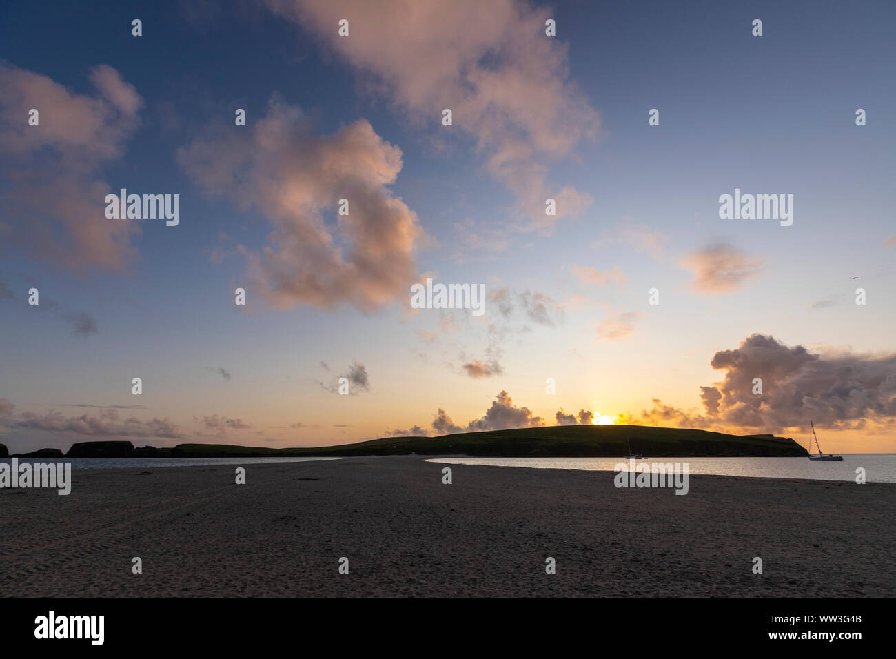 St Ninian’s beach at sunset with St Ninian's Isle, connected by a ...
