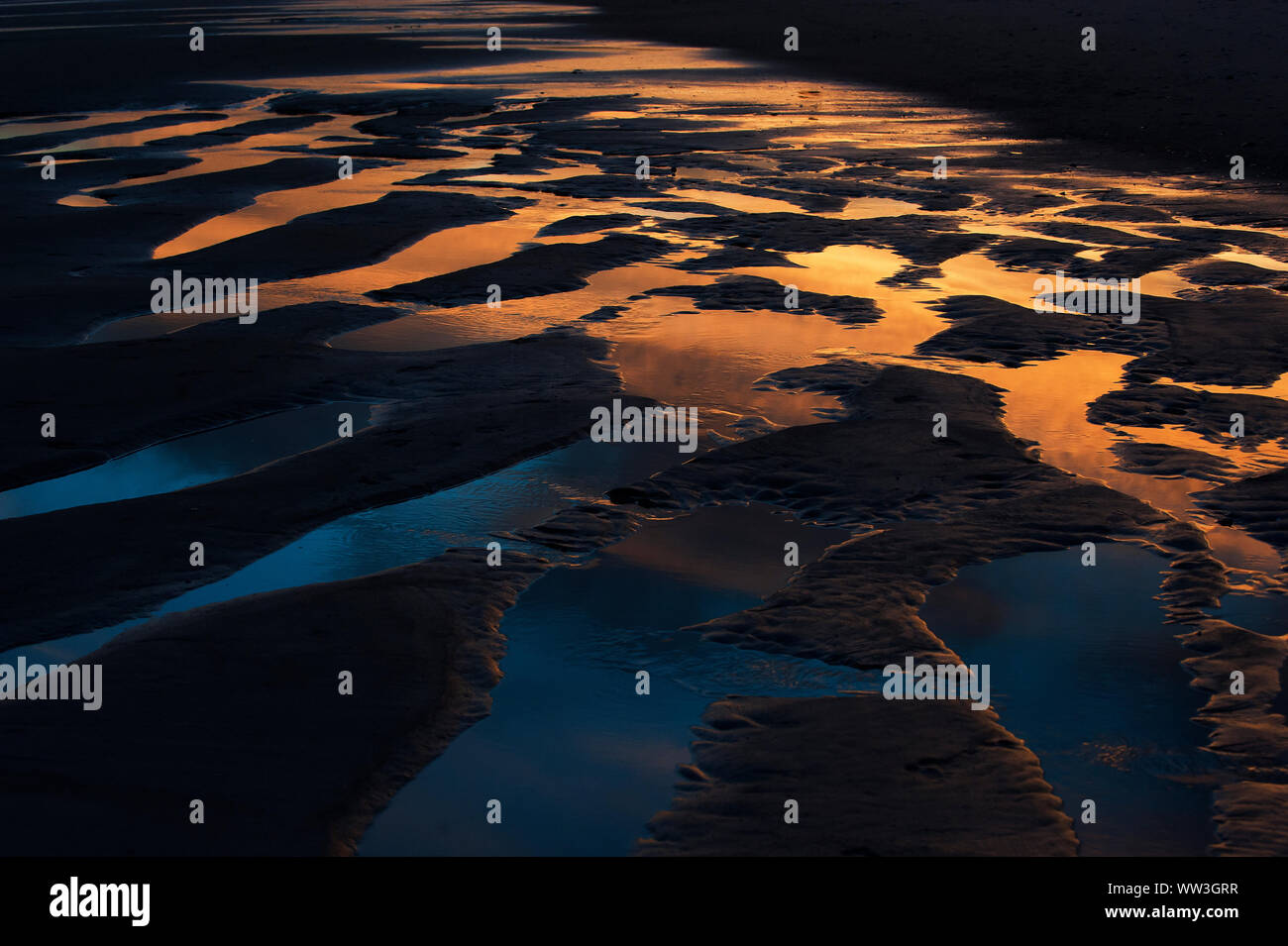Tide pool abstract, landscape pattern on beach just after sunset Stock ...