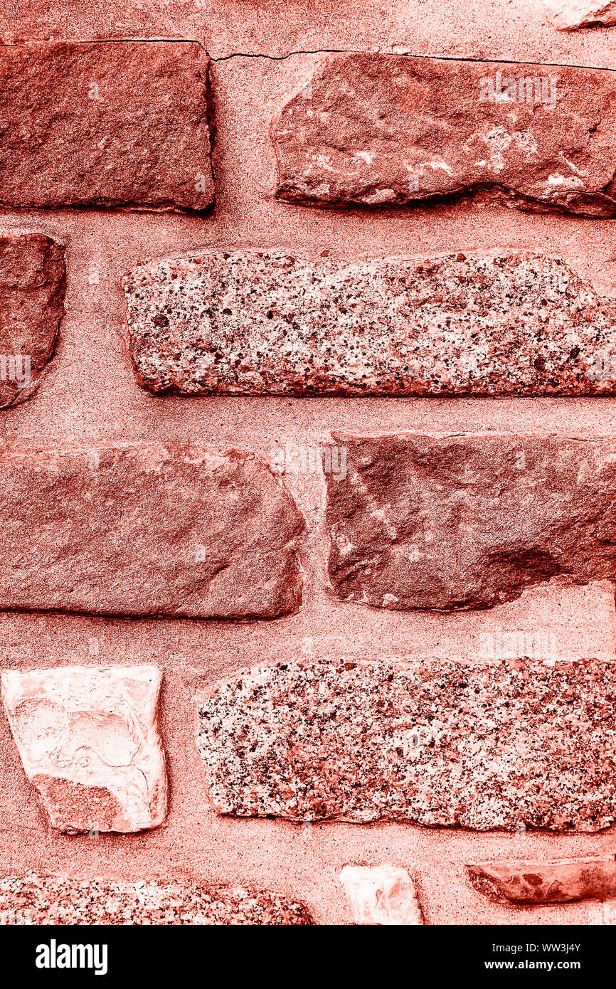 Rock bricks patterned laying coral trend Textured Stock Photo - Alamy