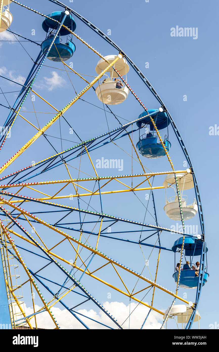 Ferris wheel close up against the blue sky and clouds Stock Photo - Alamy