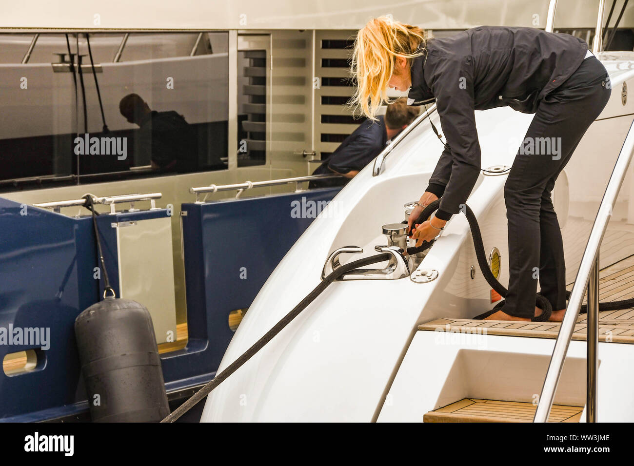 Tying mooring line on yacht hi-res stock photography and images - Alamy
