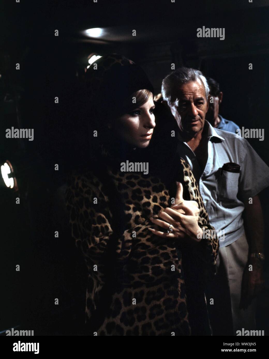 BARBRA STREISAND as Fanny Brice with director WILLIAM WYLER in FUNNY ...