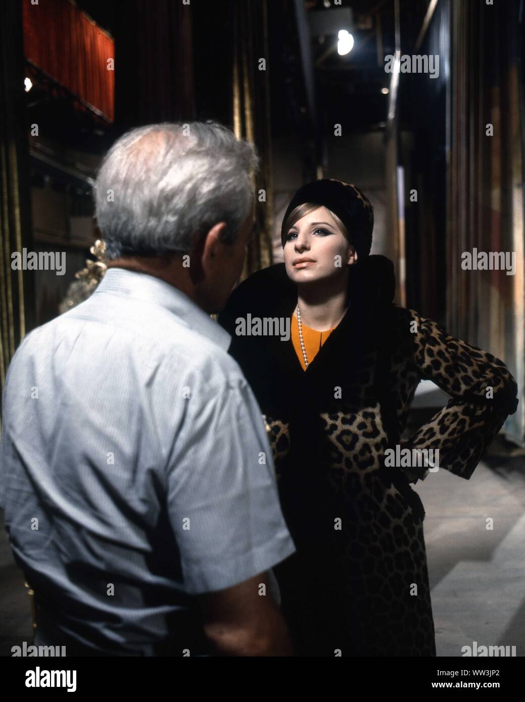 BARBRA STREISAND as Fanny Brice with director WILLIAM WYLER in FUNNY ...