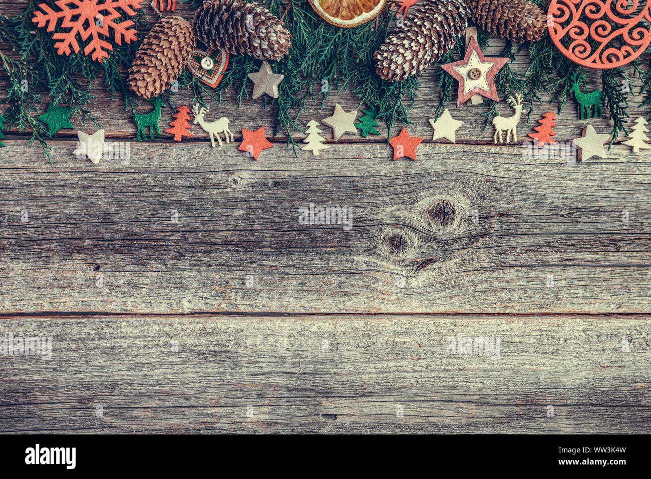 Festive objects of New Year and Christmas on a wooden background Stock ...