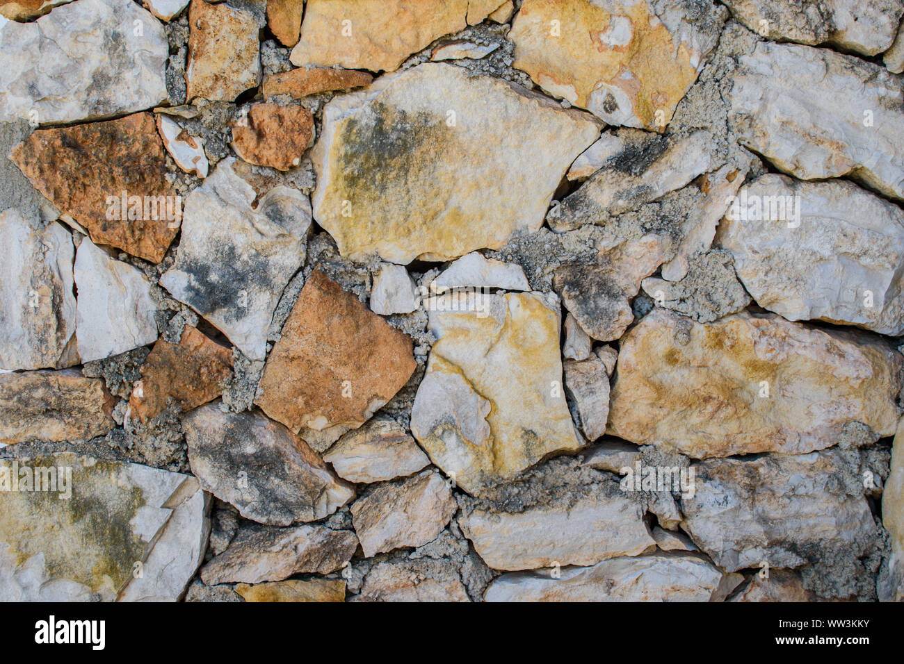 Wall of large natural stones, natural background. Great for design and ...