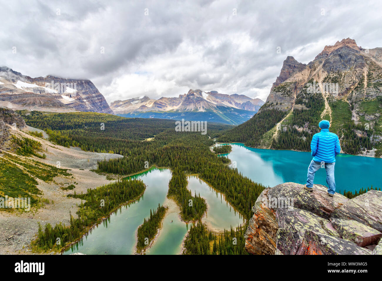 Late Summer hiker on top of Opabin Prospect overlooking Lake O'Hara and ...