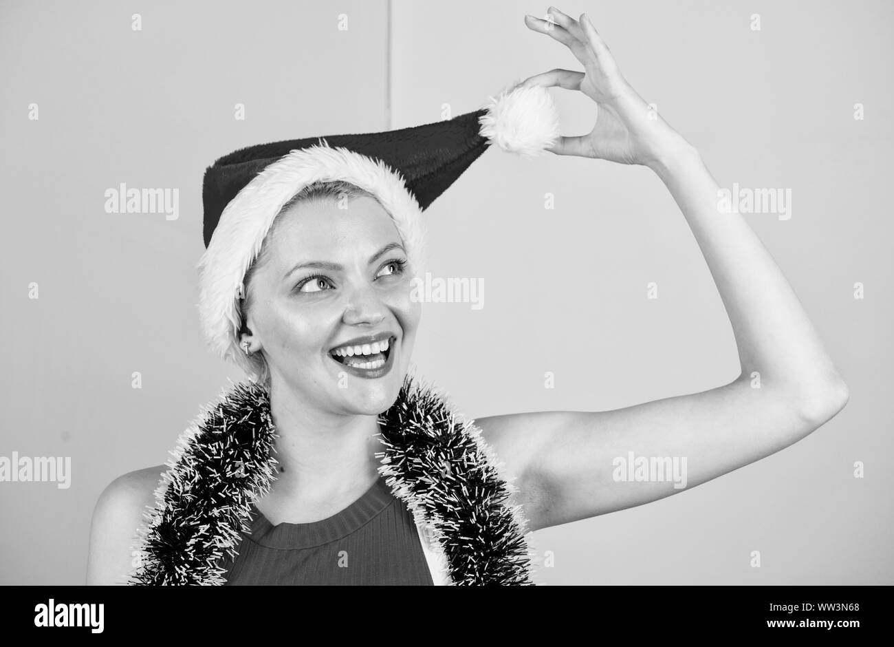 Woman santa hat gift Black and White Stock Photos & Images - Alamy