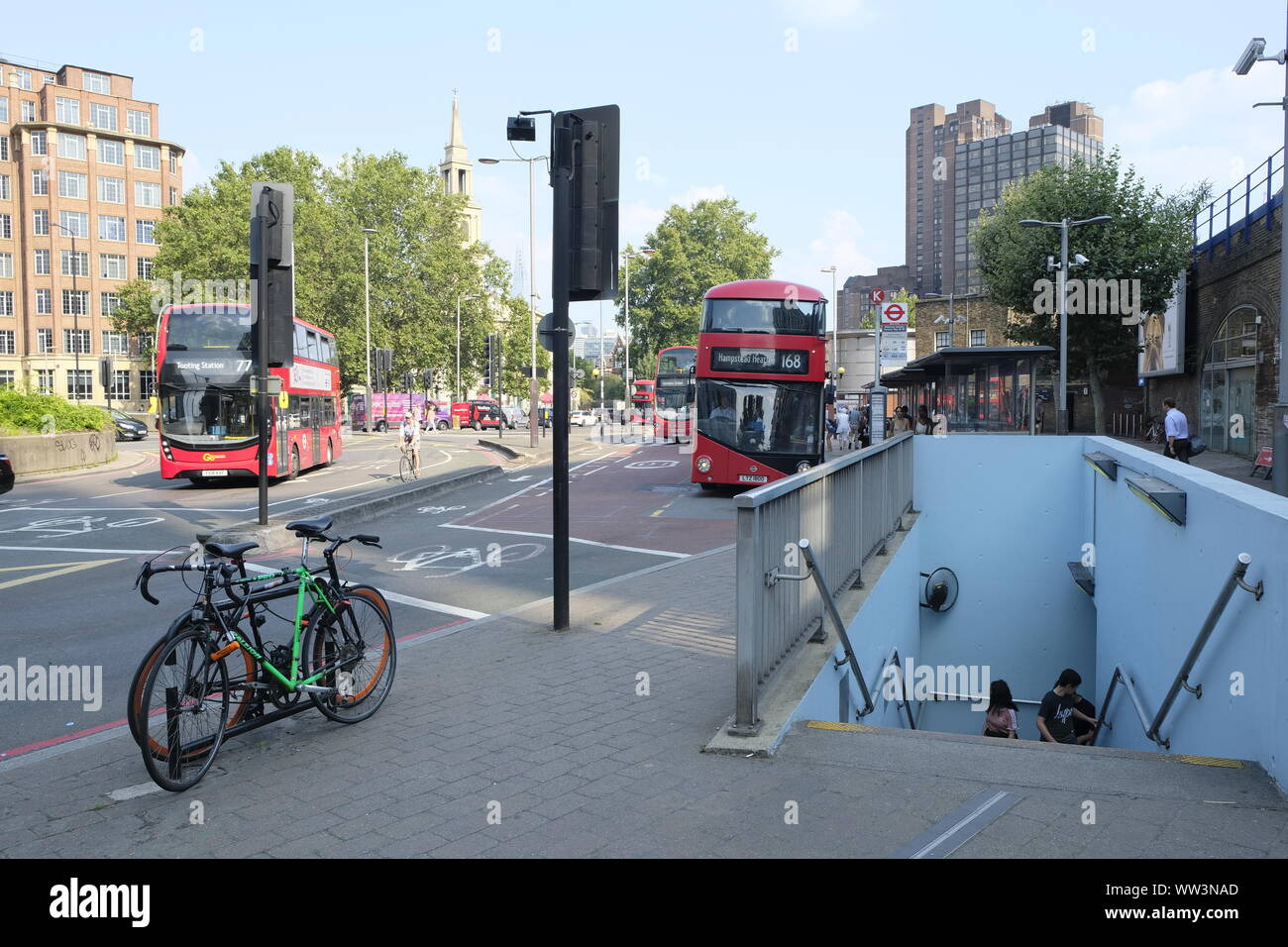 August 2019. Red double decker buses in London traffic, London, UK ...