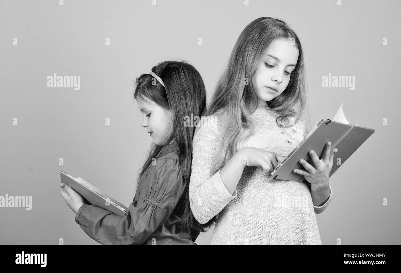 Friendship and sisterhood. students reading a book. School project ...
