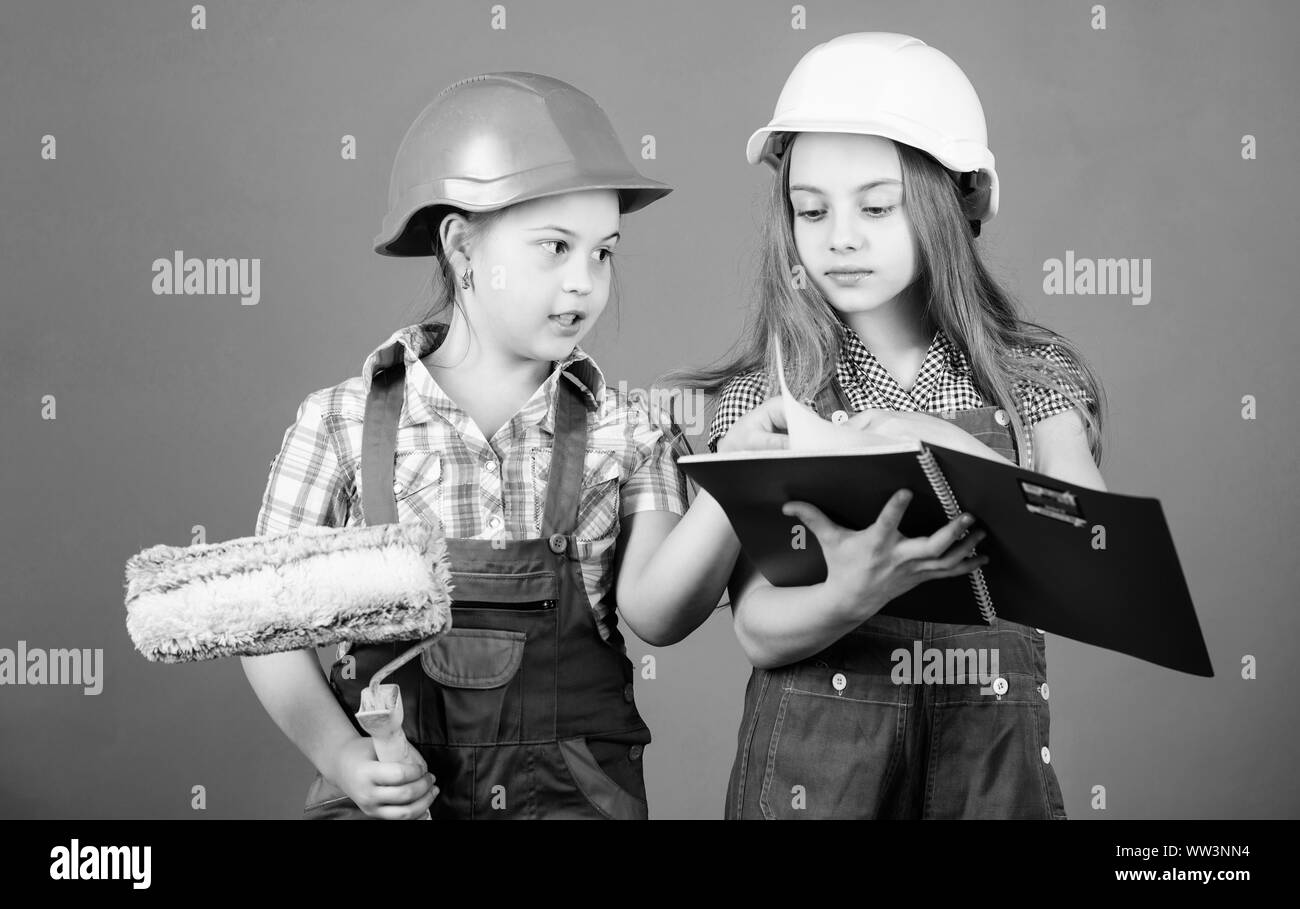 Home improvement activities. Kids choosing paint colour for their new ...