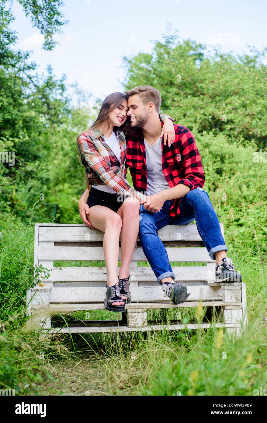 Boyfriend And Girlfriend Sitting Together