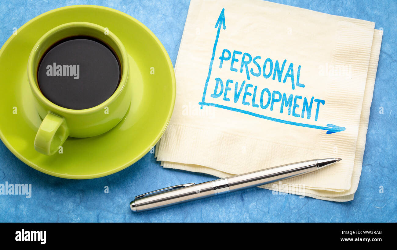 personal development -handwriting on napkin with a cup of coffee Stock ...