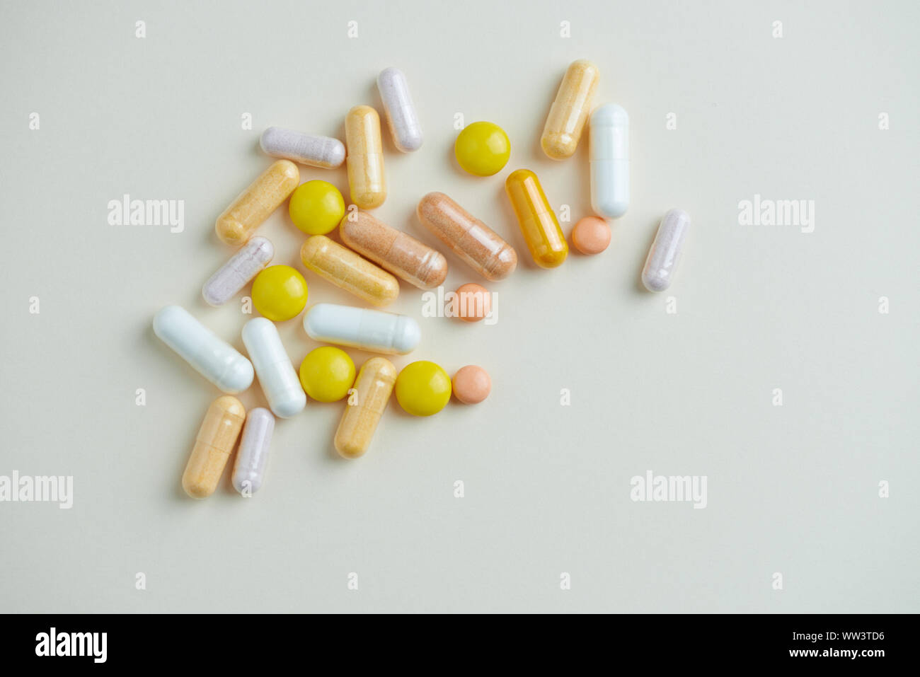 Vitamins on bright paper background. Concept for a healthy dietary ...