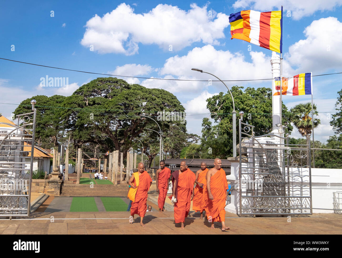 ANURADHAPURA/ SRI LANKA - AUGUST 07, 2019: The Unspecific monks walking ...
