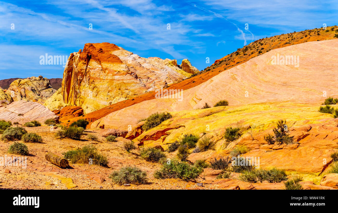 The colorful red, yellow and white banded rock formations along the ...