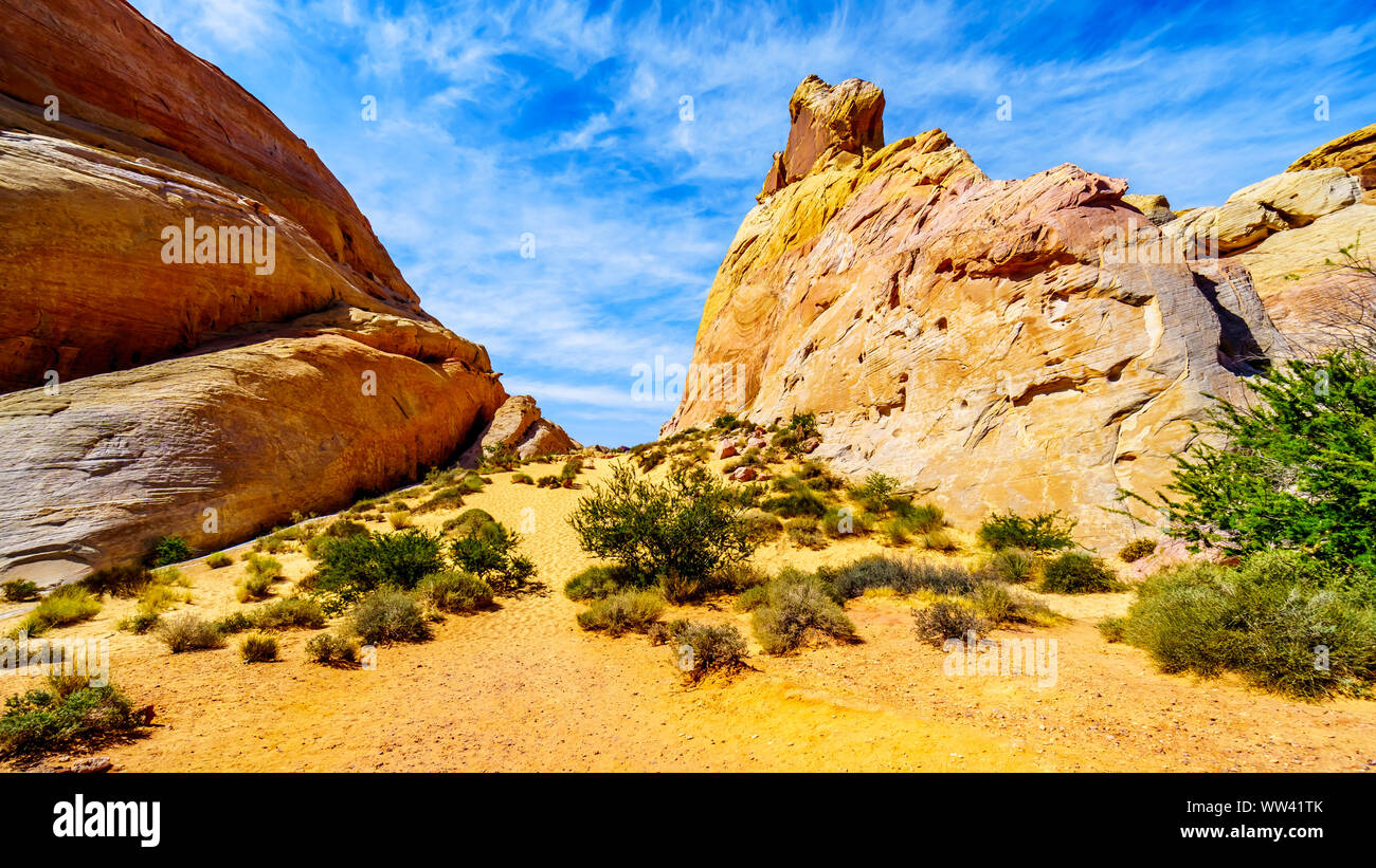 The colorful red, yellow and white banded rock formations along the ...