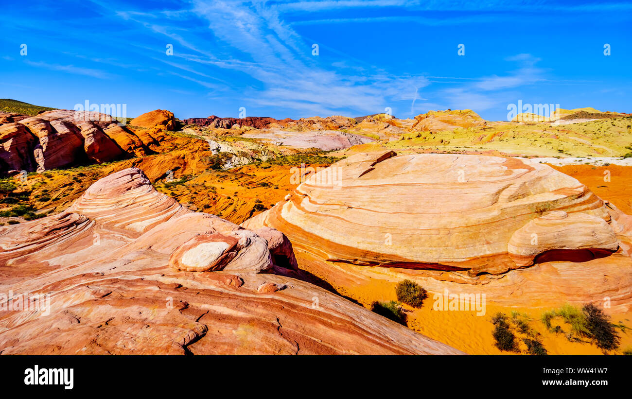 The colorful red, yellow and white banded rock formations along the ...