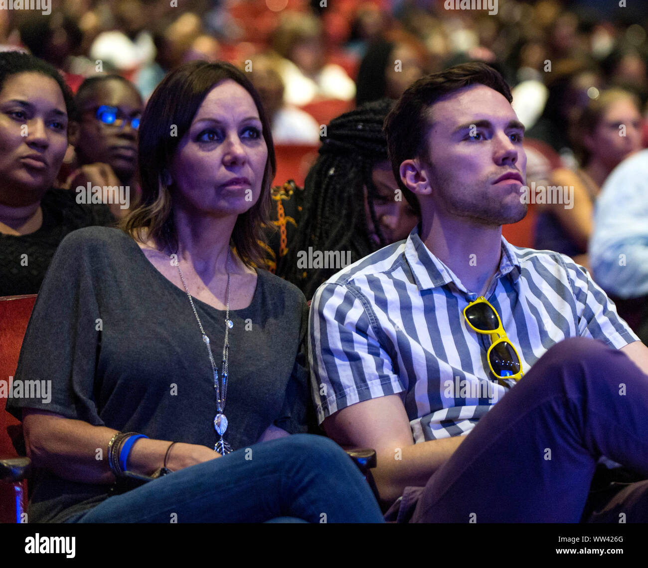 Houston, Texas, USA. 12th Sep, 2019. Students and others watch the ...