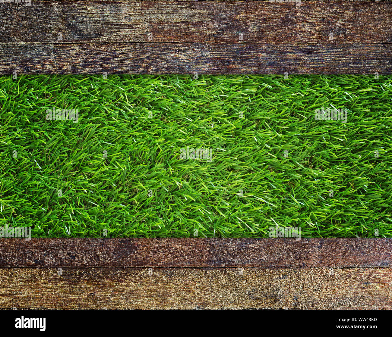Retro wood plank on green grass texture background Stock Photo - Alamy