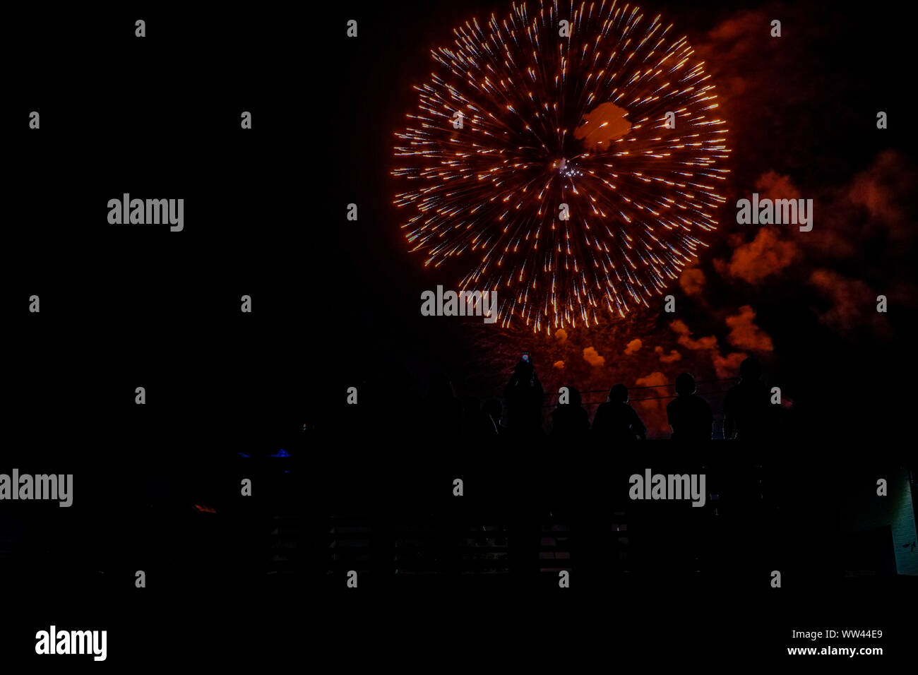 People watching fireworks Stock Photo - Alamy