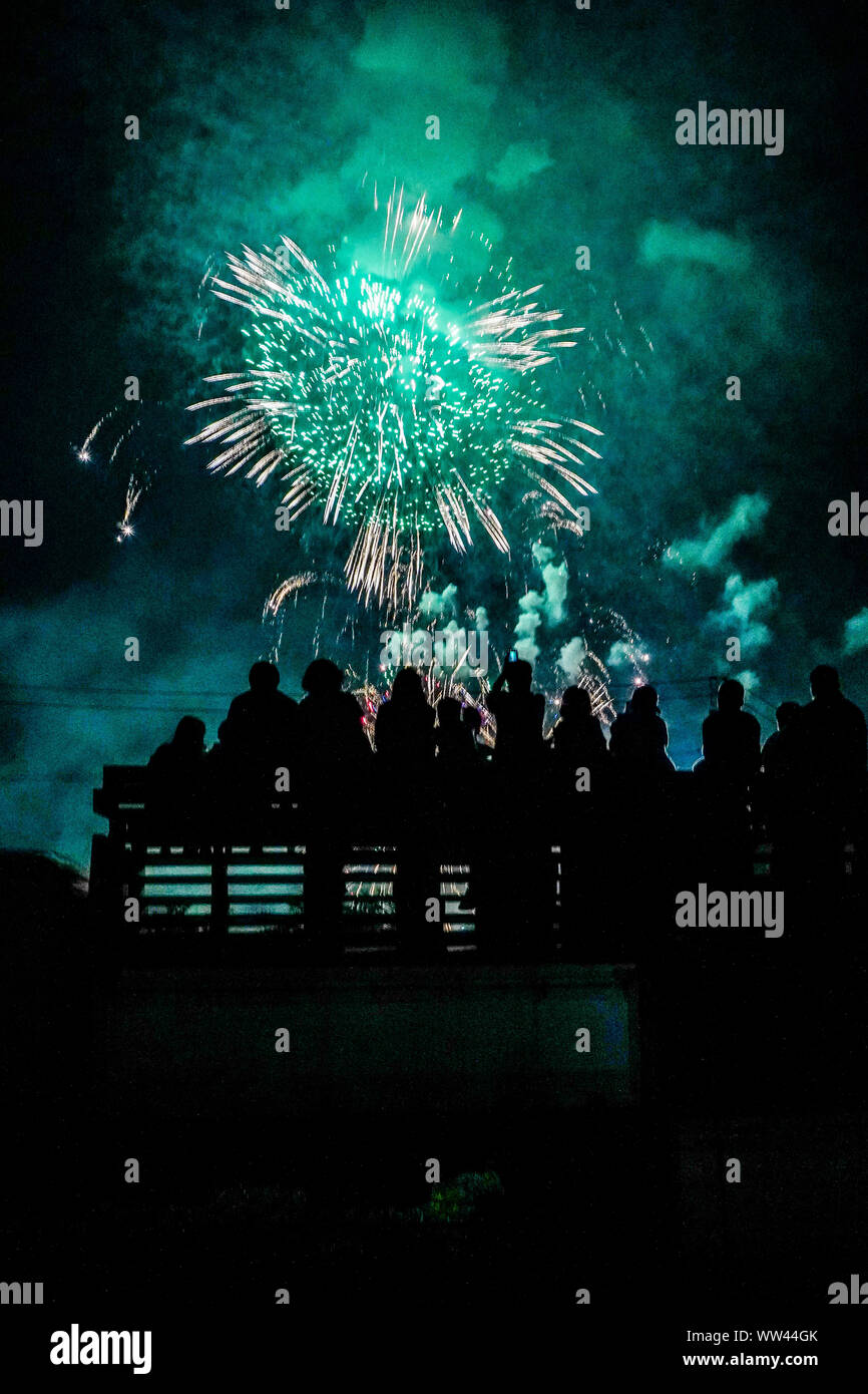 People watching fireworks Stock Photo - Alamy