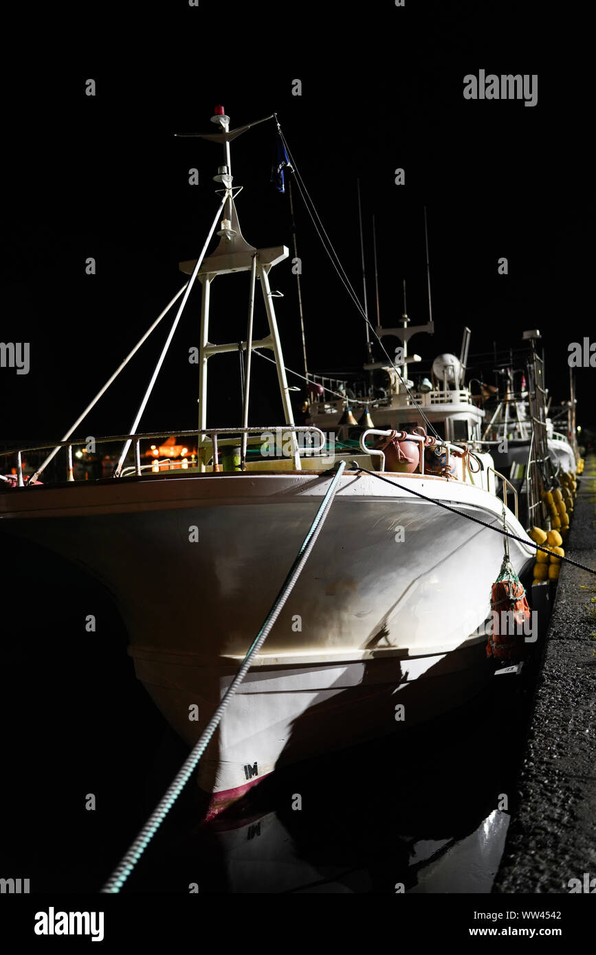 Fishing boat at night Stock Photo - Alamy