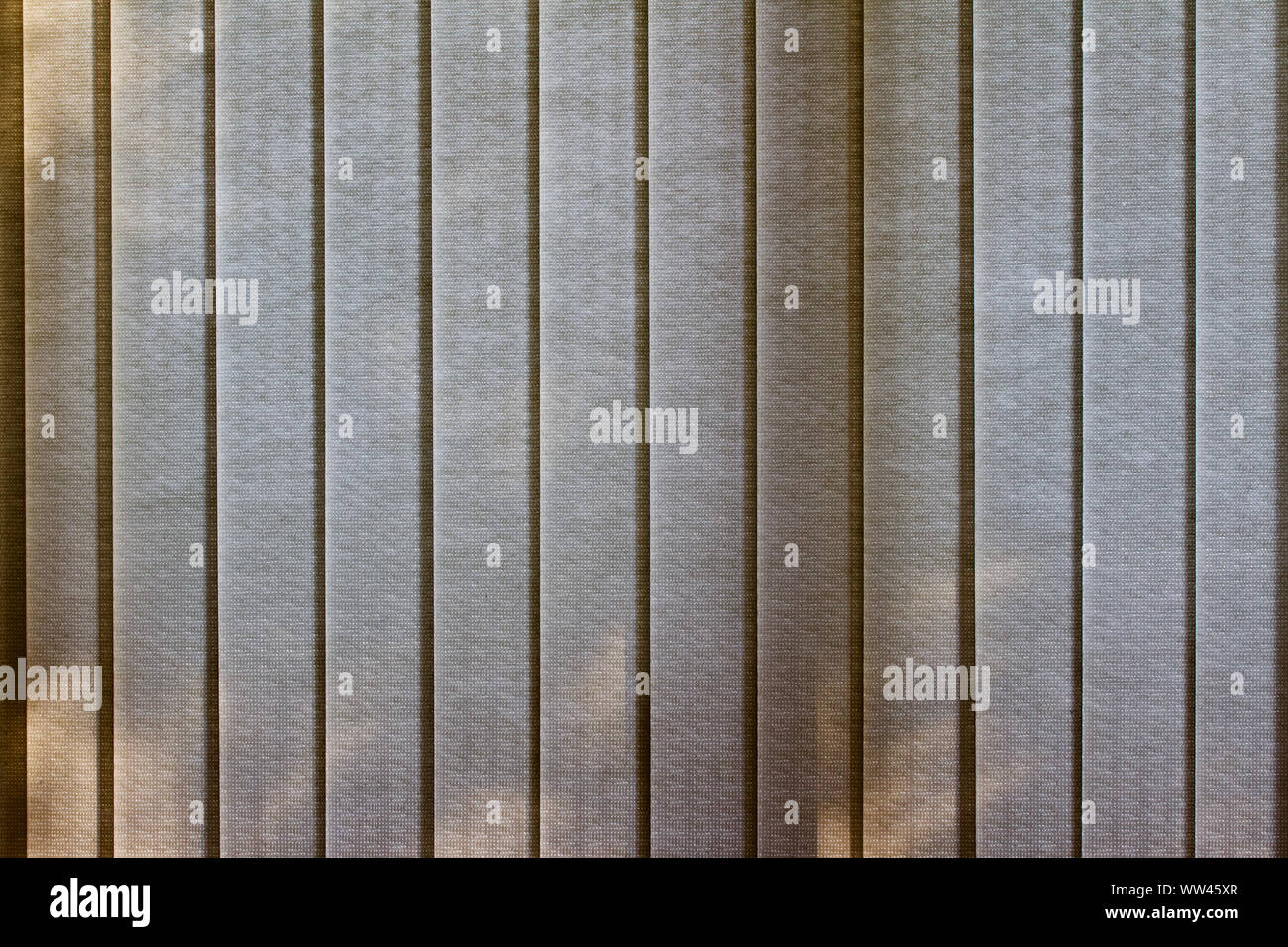 Abstract texture design of beige color vertical window blinds with ...