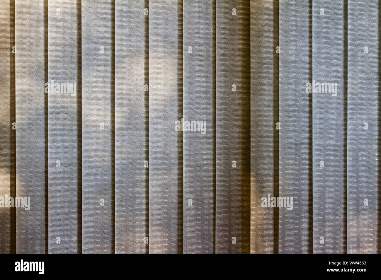 Abstract texture design of beige color vertical window blinds with ...