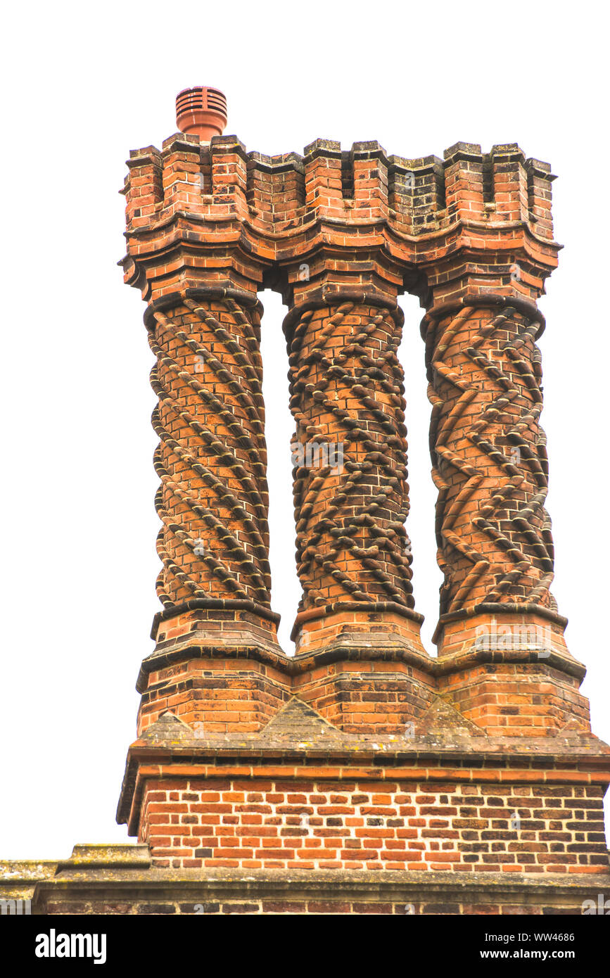 Isolated architectural detail of three decorative 16th century chimneys ...