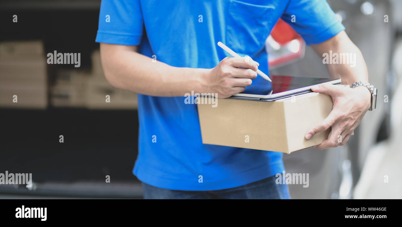 Professional delivery man preparing the products to customer, checking ...