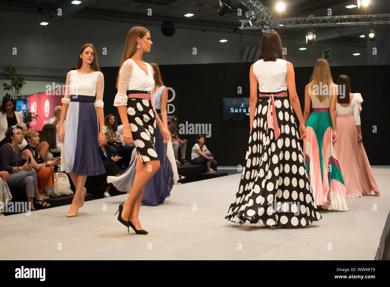 Madrid, Spain. 12th Sep, 2019. The models parade the last time over the ...