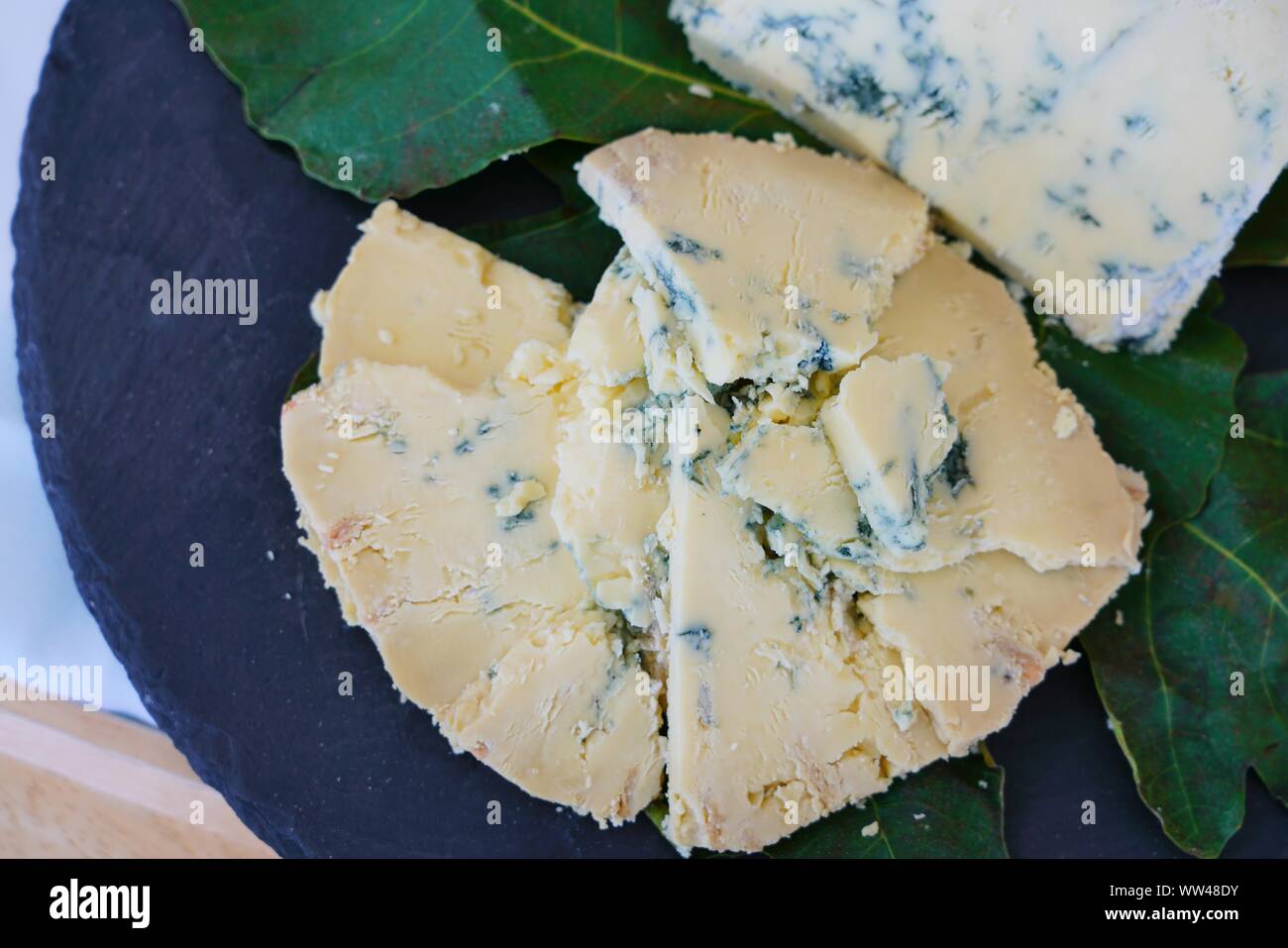 Platter of blue cheese slices Stock Photo - Alamy