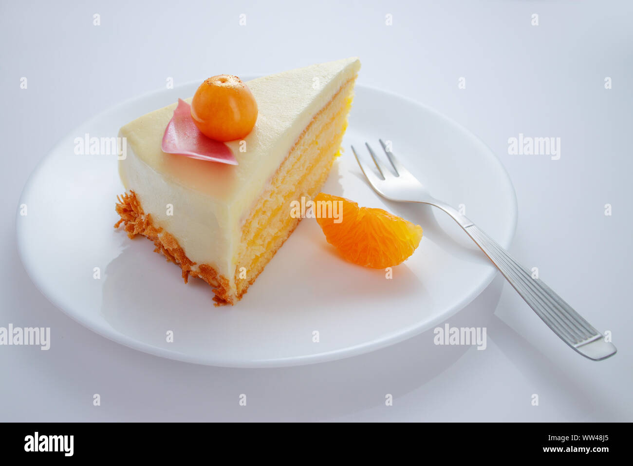 Chocolate cake with physalis fruits, cream, nuts and mousse Stock Photo ...