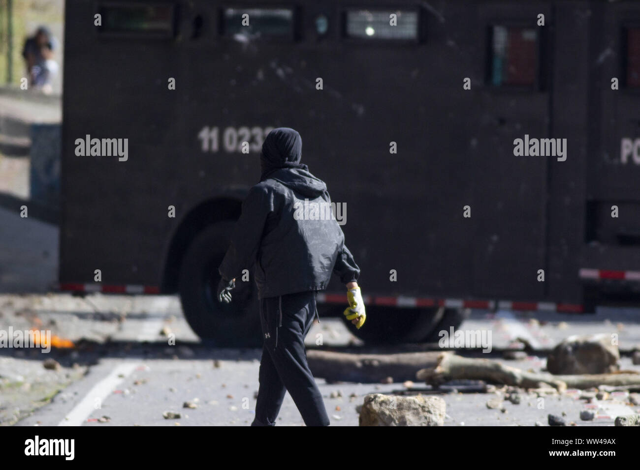 June 4, 2019: Hooded men throw stones at the riots of the La Macarena ...