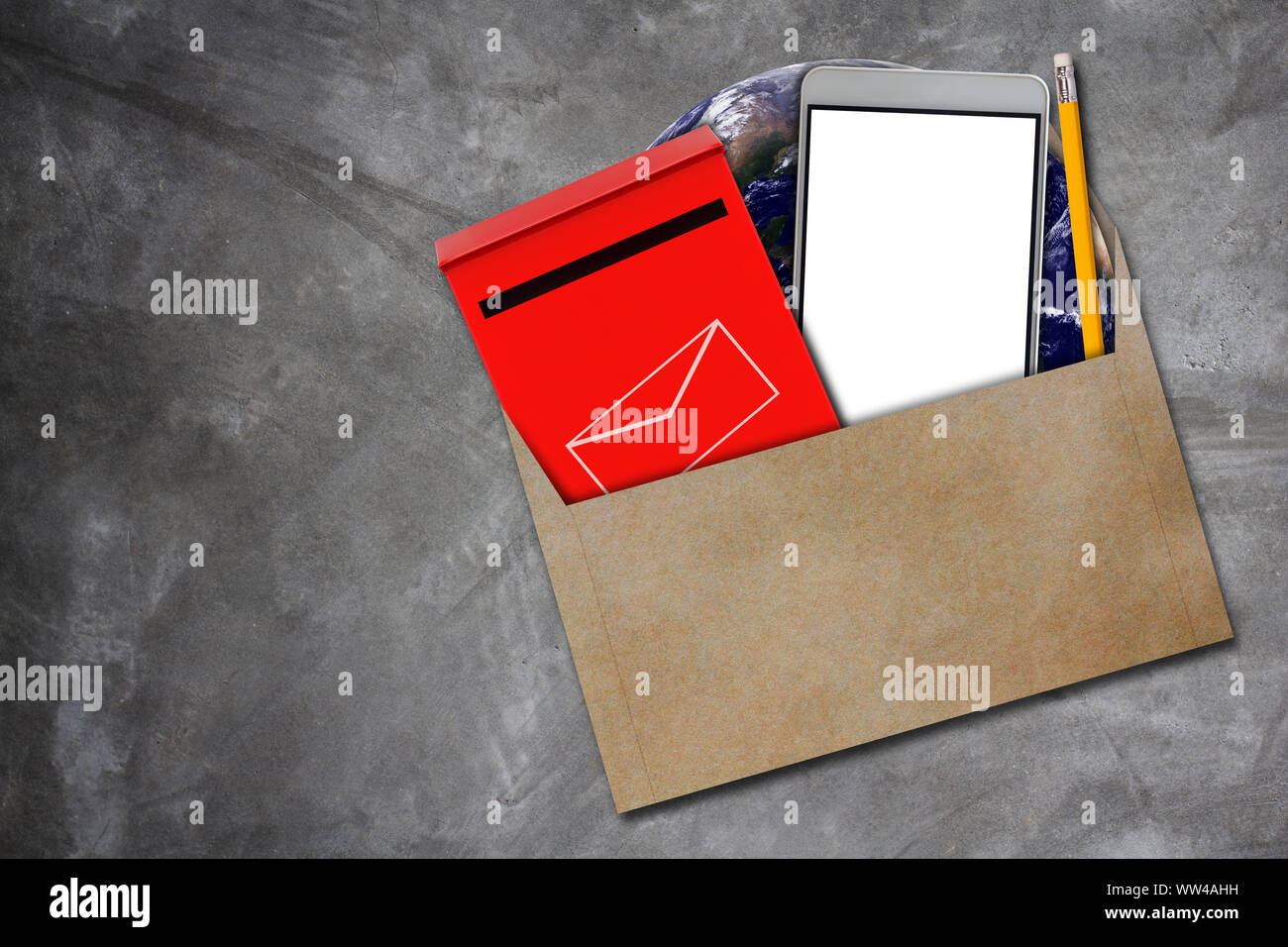Communication concept, red mail box, mobile phone and yellow pencil on ...