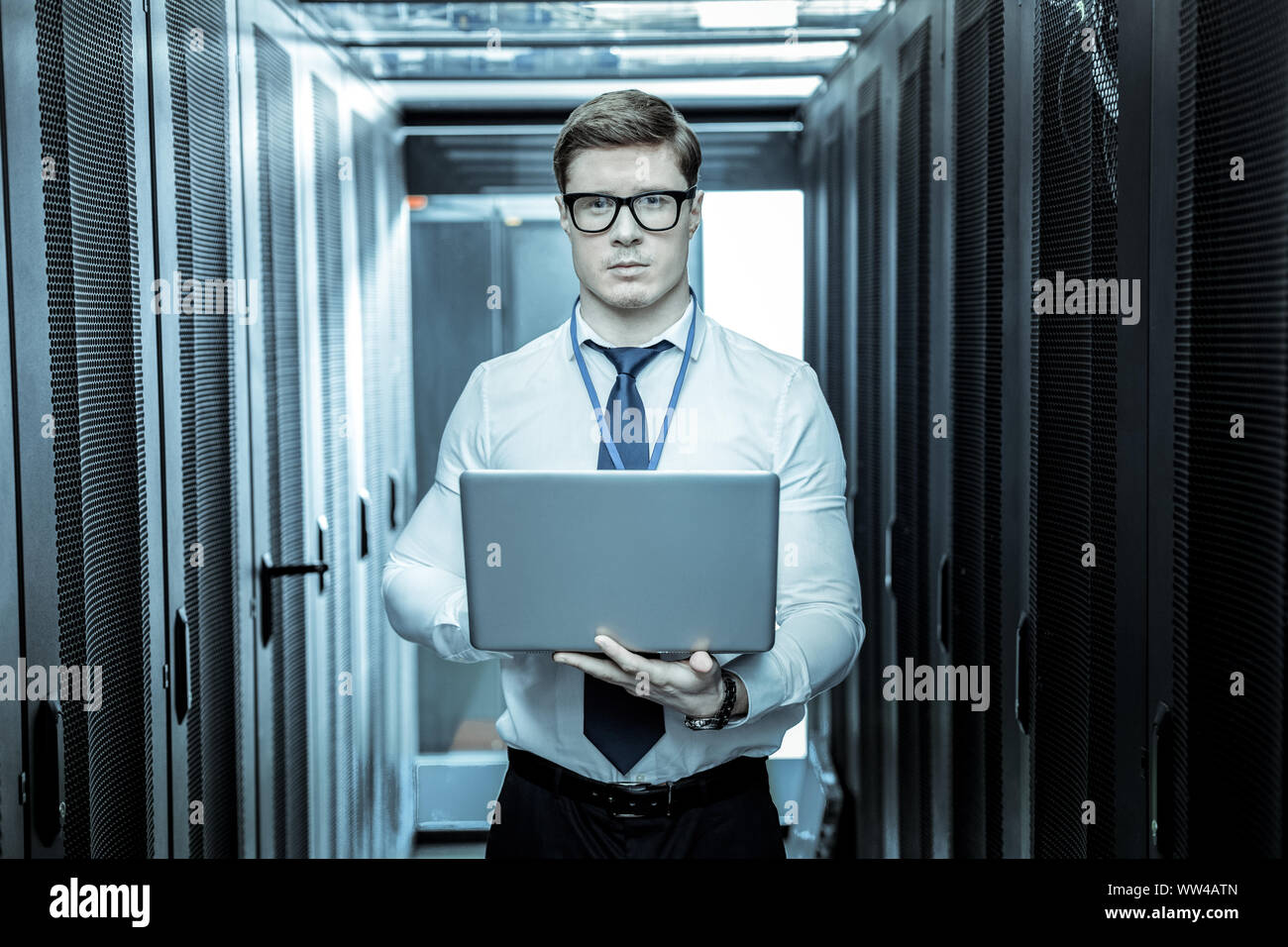 Police looking at laptop hi-res stock photography and images - Alamy