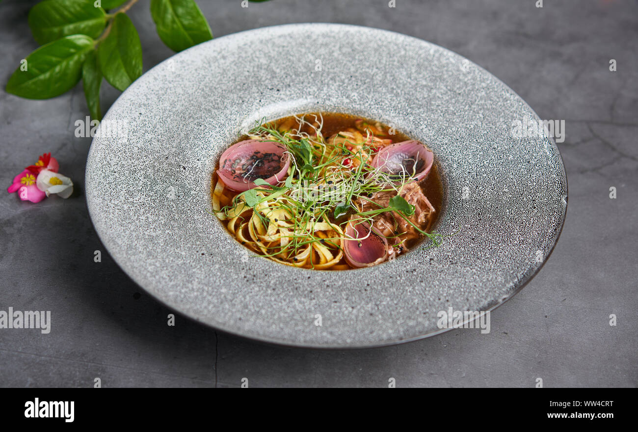 delicious easy Asian soup in the plate Stock Photo - Alamy