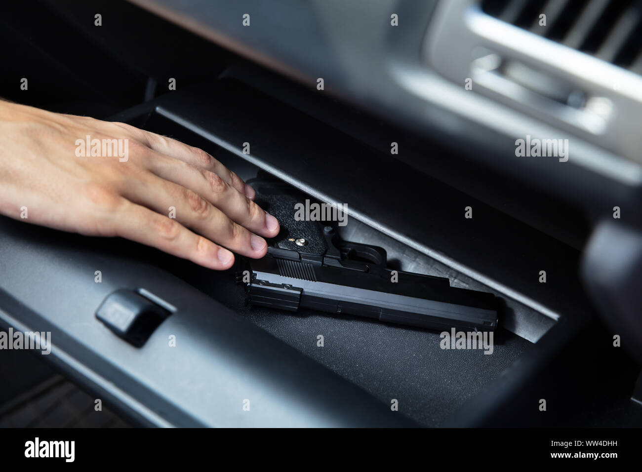 Man shooting handgun from car hi-res stock photography and images - Alamy
