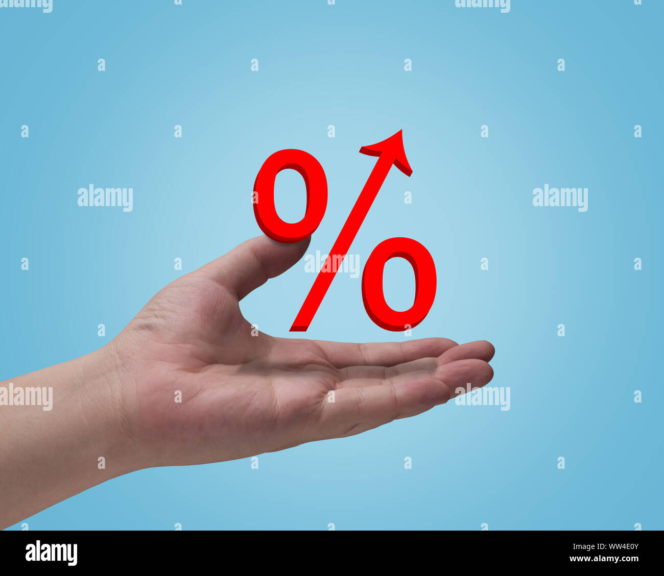 Hand and interest rate symbol on blue background, business financial ...
