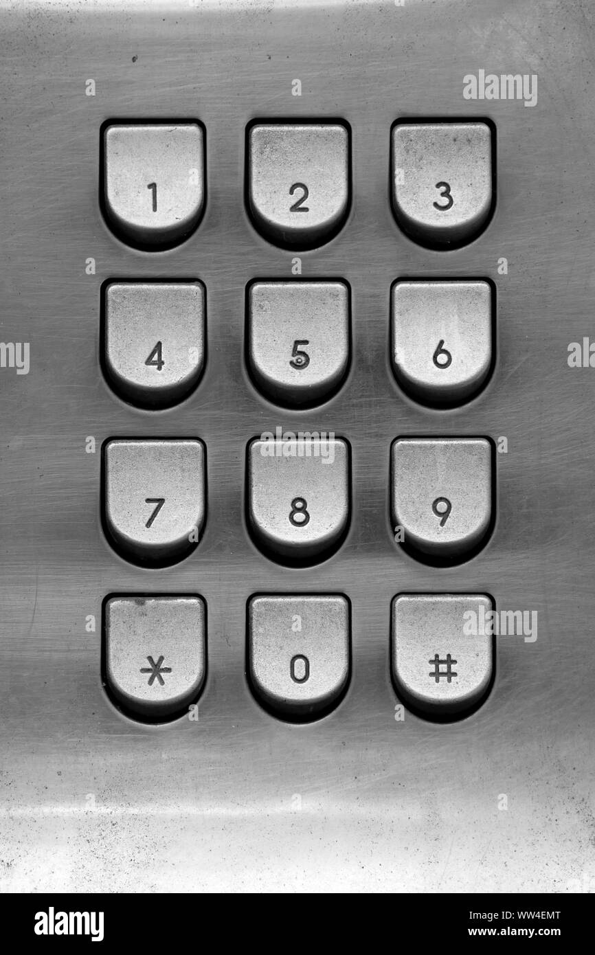 old Telephone buttons metal , Public telephone Stock Photo - Alamy