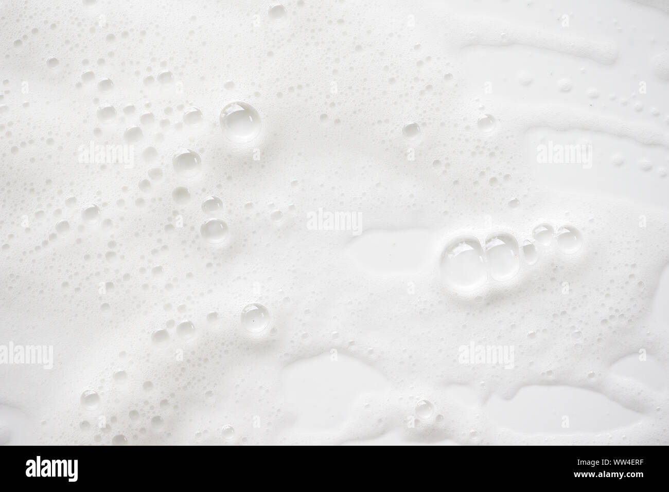 Abstract background white soapy foam texture. Shampoo foam with bubbles ...