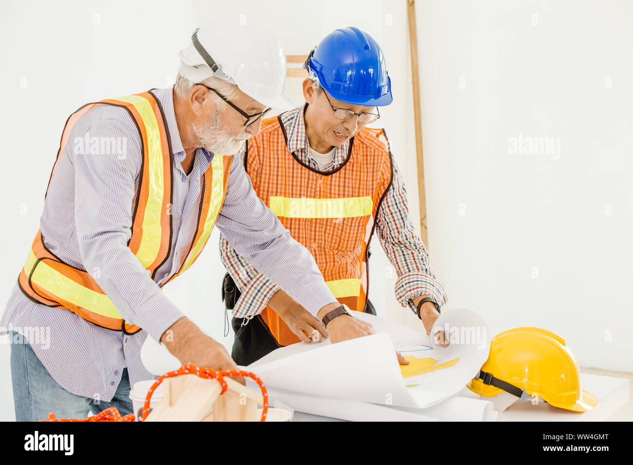 Happy professional worker working together home builder architecture ...