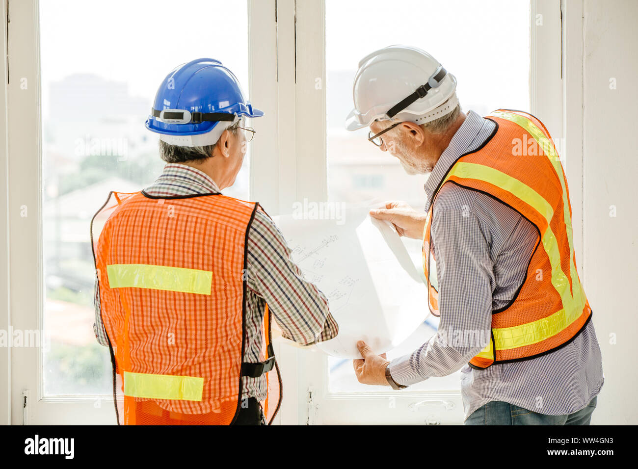 Happy professional worker working together home builder architecture ...