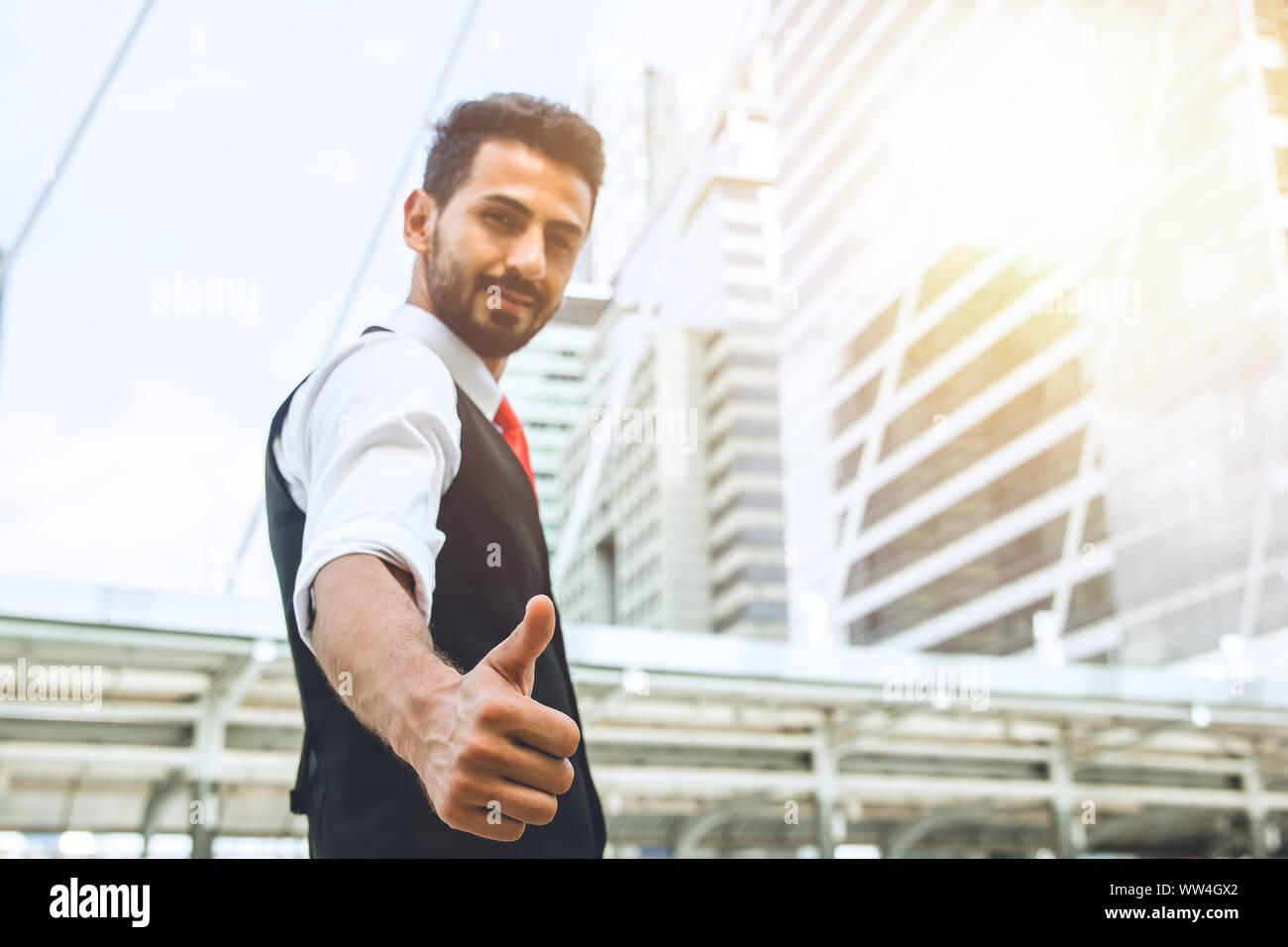 Business man good job thumb up hand showing outdoor office city ...